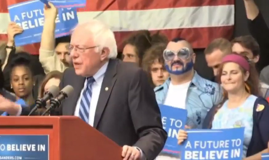 Man With Blue Beard Blows Kisses At Bernie - Washington Examiner