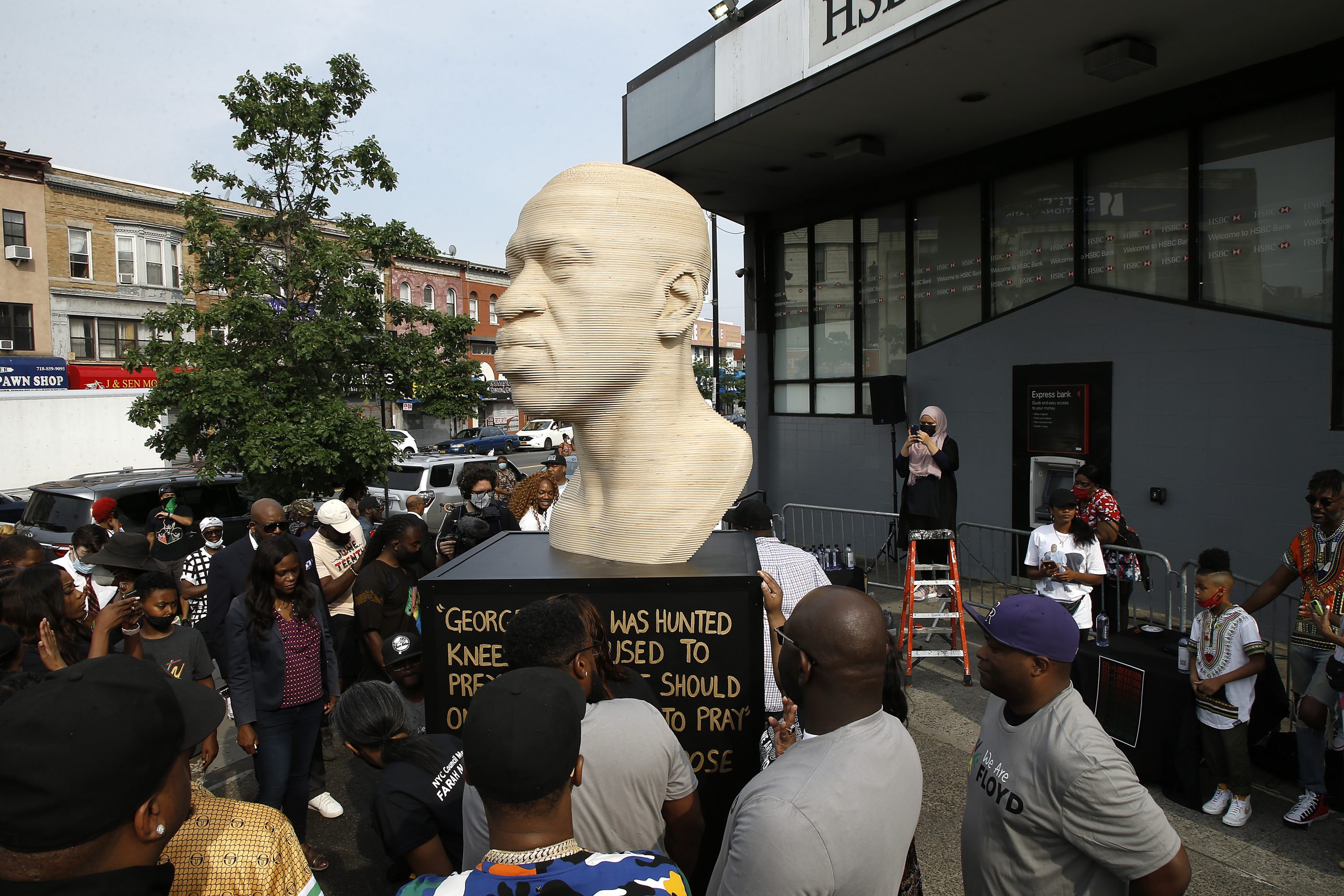 Two George Floyd statues vandalized after unveiling in New York and New ...