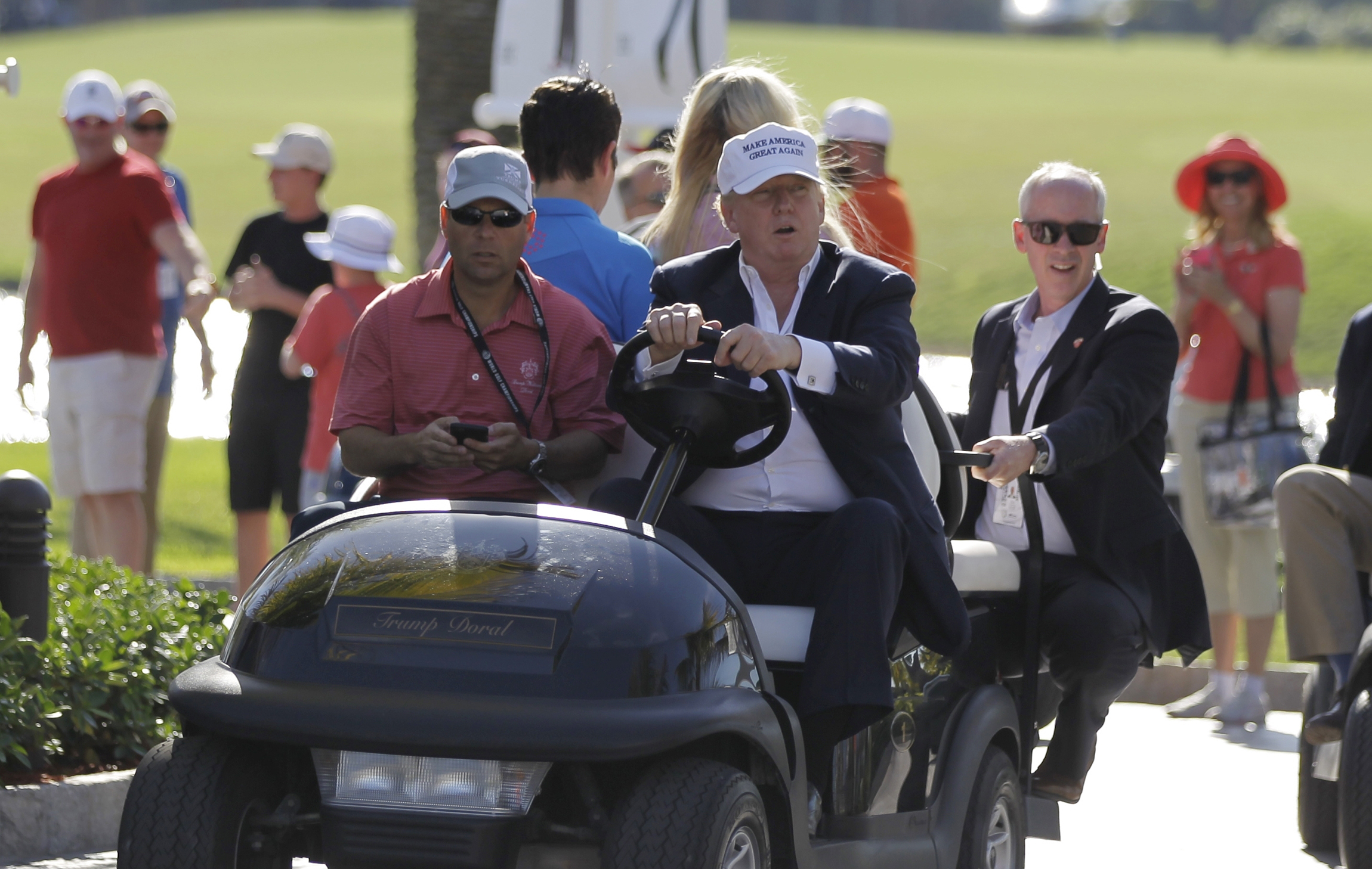 Trump visits golf course after tweeting Obama wiretap accusations ...