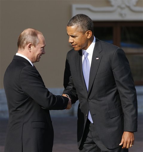 Gif: Putin and Obama’s handshake showdown in Russia - Washington Examiner